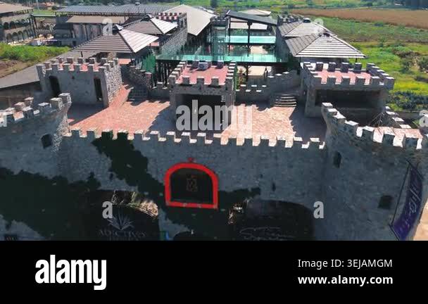 Cinematic Aerial Drone Orbit View of a Modern Castle Style Tequila ...