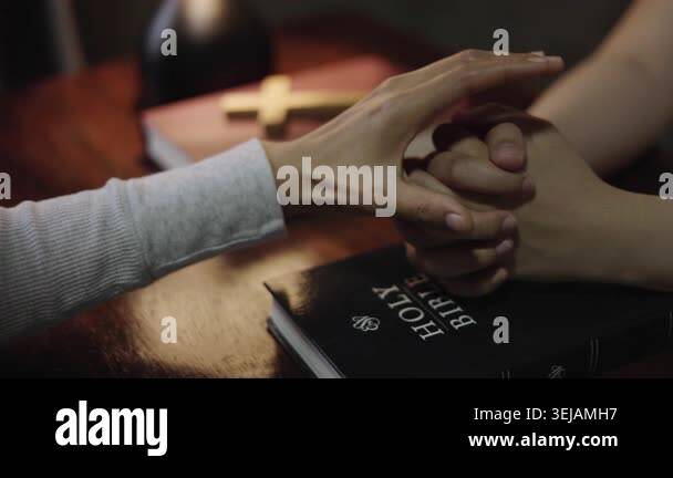 Christian group of people holding hands praying worships together to ...