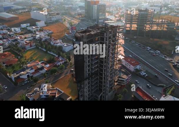 Contemporary Building Under Construction with Industrial Crane and ...