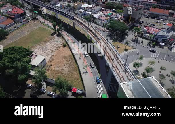 Cinematic Aerial Drone Panoramic View of the Elevated Light Rail Train ...