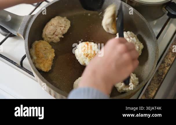 Fish patties cook evenly with golden crust while being flipped using ...