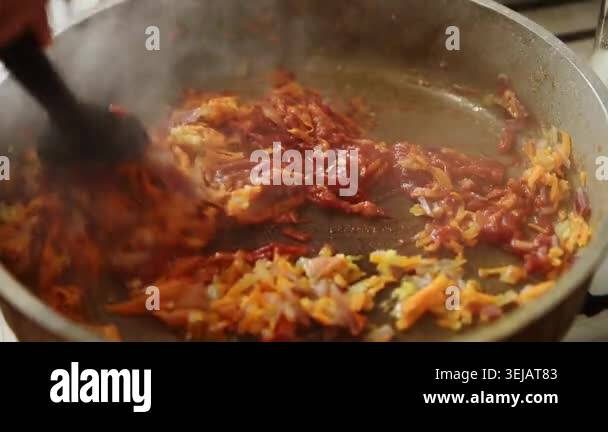 Vibrant tomato paste blended with caramelized onions and shredded ...