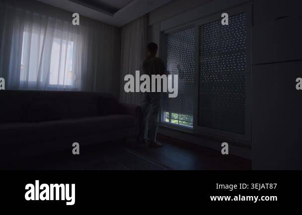 Closing blinds in dark apartment, emotional isolation and mental health ...
