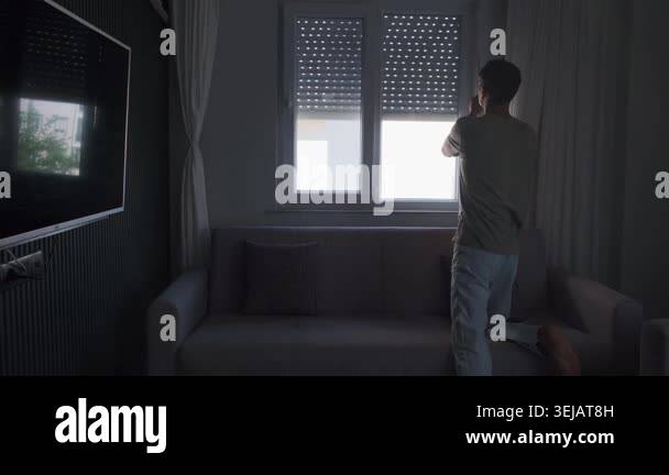 Closing blinds in dark apartment, emotional isolation and mental health ...
