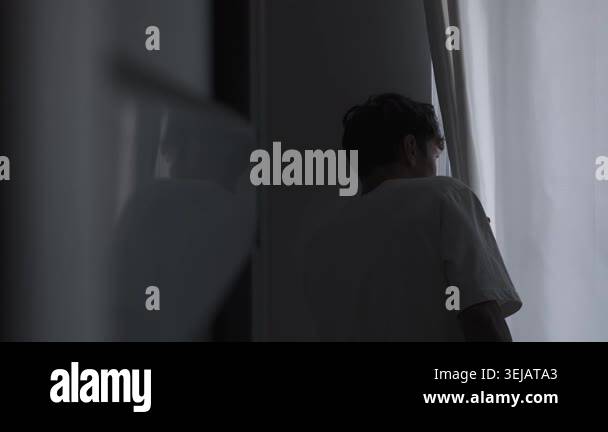 Thriller and suspense atmosphere with mysterious person peeking through ...