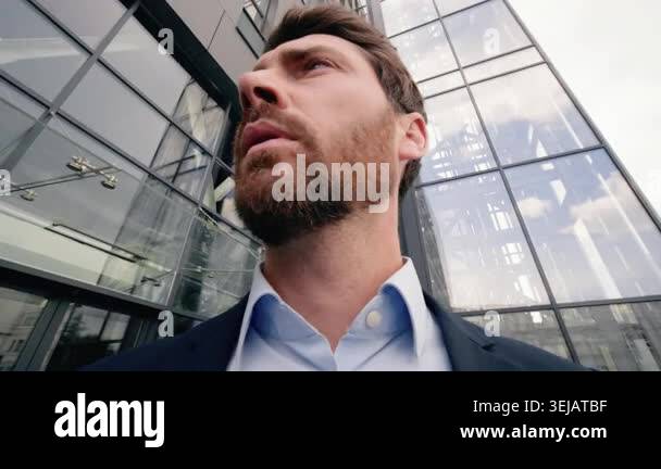 Worried Caucasian middle aged business man looking mobile phone lost in ...