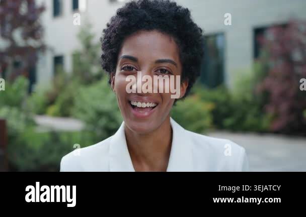 Emotional excited African American business woman laughing hearing ...