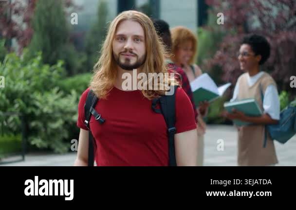 Carefree Caucasian student guy man male smiling happy showing thumb up ...