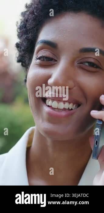 Carefree African American business woman happy talking call with mobile ...
