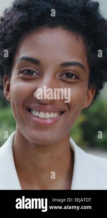 Portrait joyous African American businesswoman happy laughing smiling ...