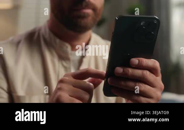 Cropped view man holding mobile phone hands scrolling touchscreen ...