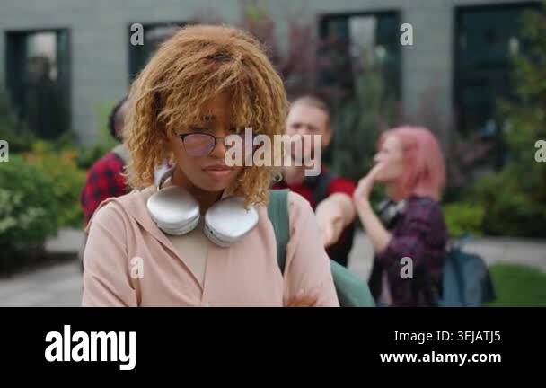 Stressed African American student girl woman suffering with bullying in ...