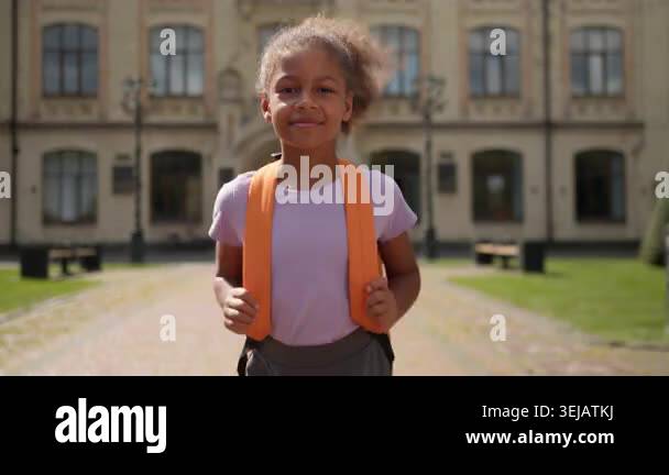 Happy smiling cute African American little student girl child kid ...