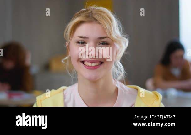 Female teenager happy Caucasian girl student smiling at camera in high ...