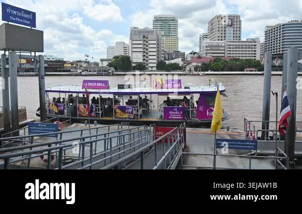 Bangkok, Thailand - August 22, 2025 : Passenger ferry boat arriving at ...