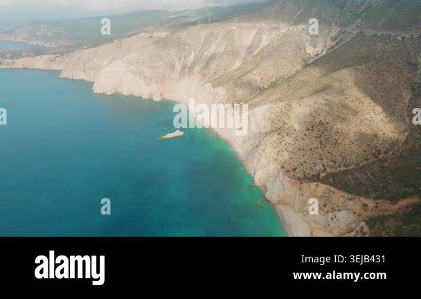 Aerial view of rugged coastline turquoise sea water on Greek island ...
