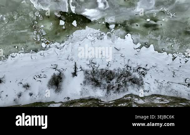 Aerial still top down video of frozen Baltic Sea at Turisalu, Estonia ...