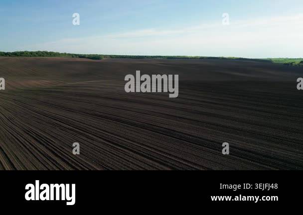 Vast agricultural landscape with fertile chernozem soil plowed and ...