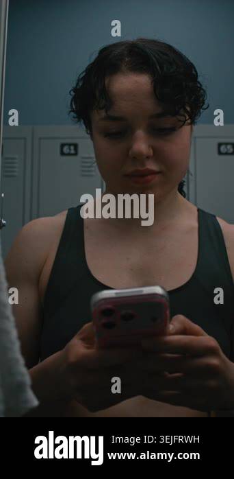 Female Athlete Using Smartphone After Workout. Sweaty Woman Types ...