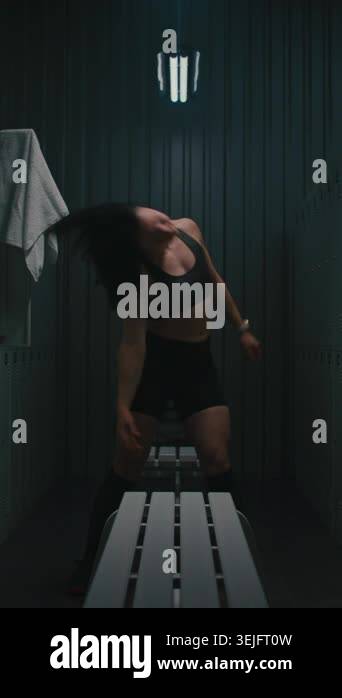 Woman Dancing With Joy in Empty Locker Room. Fit Female Celebrating ...