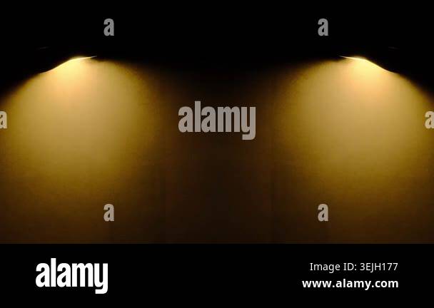 Mist floating past a street lamp at night, close view. illuminated by ...