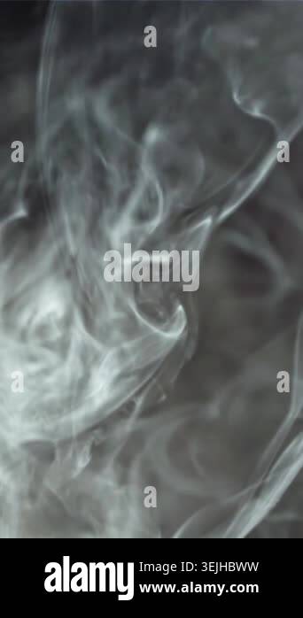 Thick white smoke. Filmed on a high-speed camera at 1000 fps. High ...