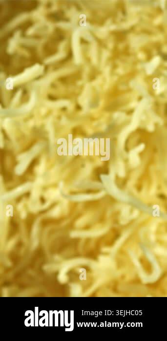 Shredded cheese flies up. Filmed on a high-speed camera at 1000 fps ...
