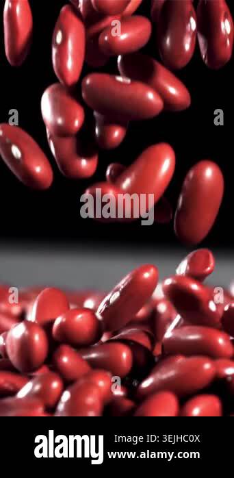 The fall of red beans. Filmed on a high-speed camera at 1000 fps. High ...