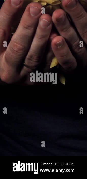Dry pasta flies up and falls in your hands. Filmed on a high-speed ...