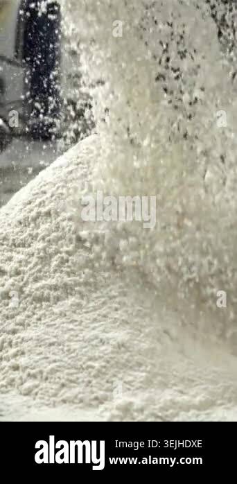 The cook sifts the flour. Filmed on a high-speed camera at 1000 fps ...
