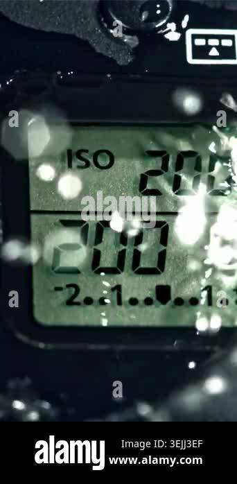 Raindrops fall on the camera display. Filmed on a high-speed camera at ...