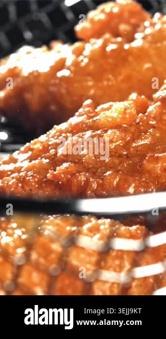 Nuggets with splash oil. Filmed is slow motion 1000 fps. High quality ...