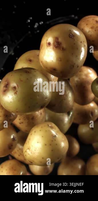 The chef tosses the potatoes in the pan. Filmed on a high-speed camera ...