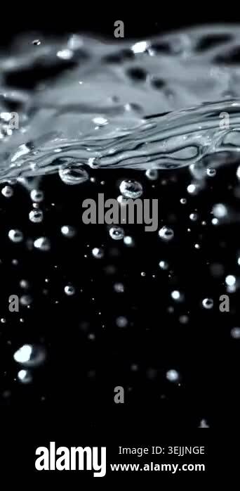Super slow motion water waves with air bubbles . Filmed on a high-speed ...