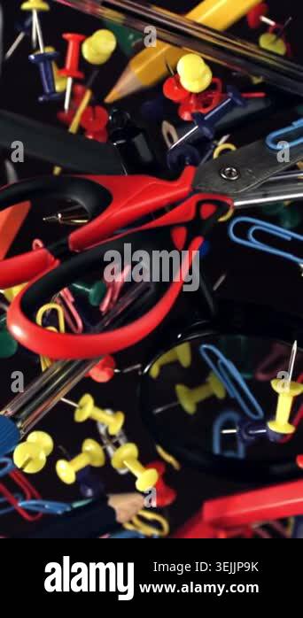 Different school tools fly up and down. Back to school. Filmed on a ...