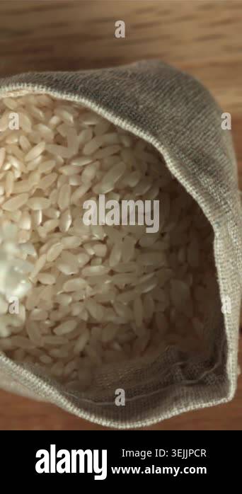 The rice falls into the bag. Filmed on a high-speed camera at 1000 fps ...