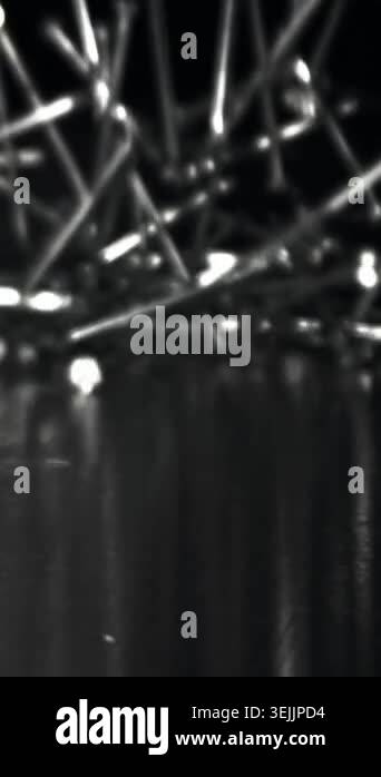 Nails fall on a metal table. Filmed on a high-speed camera at 1000 fps ...