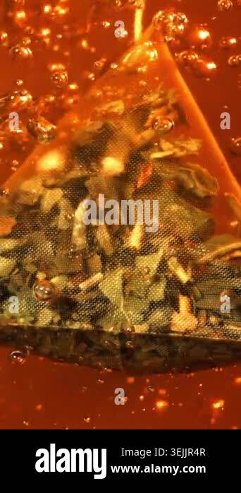 Black tea bag with air bubbles. Filmed on a high-speed camera at 1000 ...