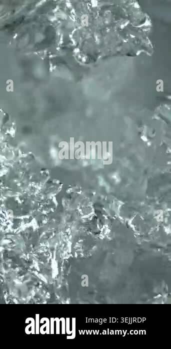 Water is poured into a glass. Filmed on a high-speed camera at 1000 fps ...