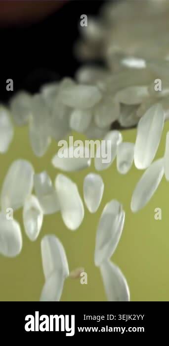 Rice falls from the scoop. Filmed on a high-speed camera at 1000 fps ...