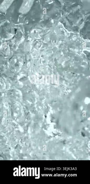 Water is poured into a glass. Filmed on a high-speed camera at 1000 fps ...