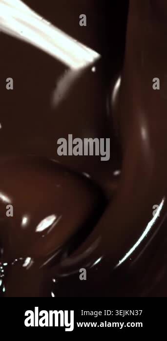 Melted liquid chocolate. Filmed on a high-speed camera at 1000 fps ...