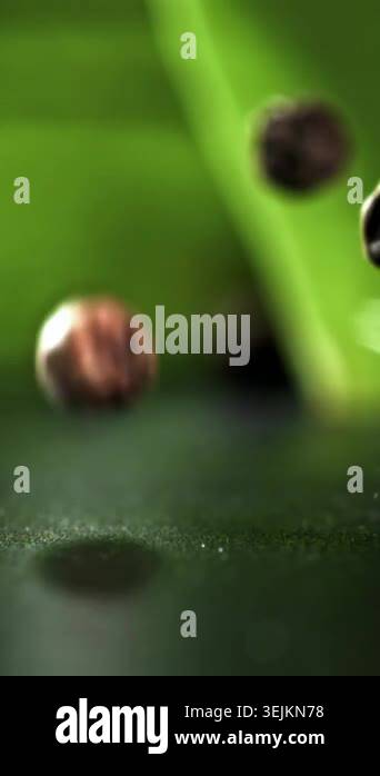 Black pepper falls on the table. Filmed on a high-speed camera at 1000 ...