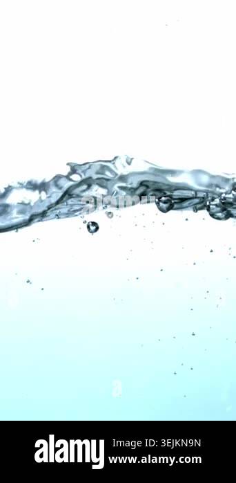 Super slow motion blue water waves with air bubbles . Filmed on a high ...