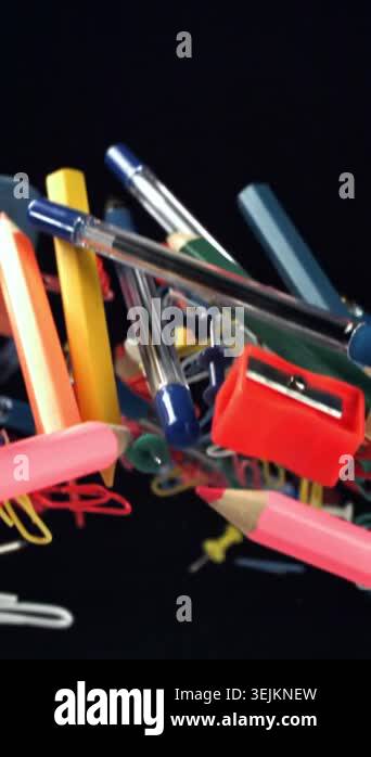 Different school tools fly up and down. Back to school. Filmed on a ...