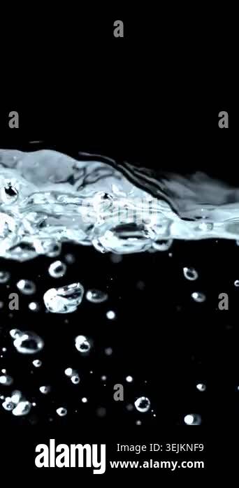 Super slow motion water splashes with air bubbles . Filmed on a high ...
