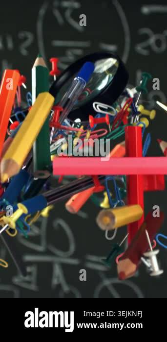 Different school objects fly and fall against the background of the ...