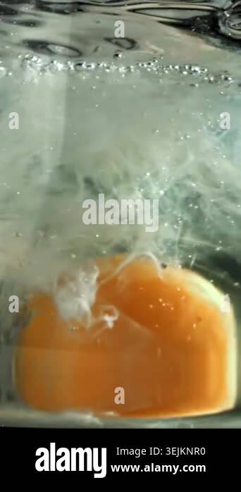 Cooking poached eggs. Filmed on a high-speed camera at 1000 fps. High ...