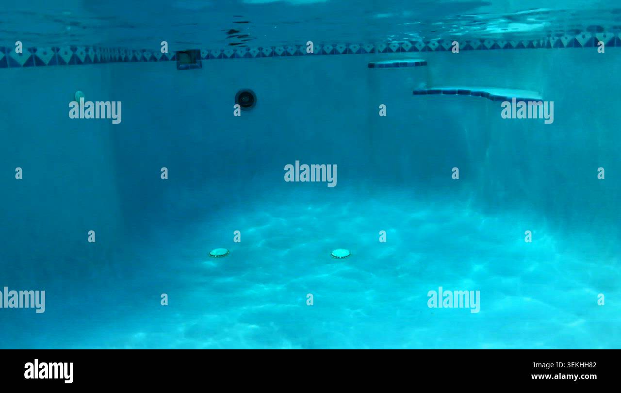 Teenager jumping into a swimming pool Stock Video Footage - Alamy