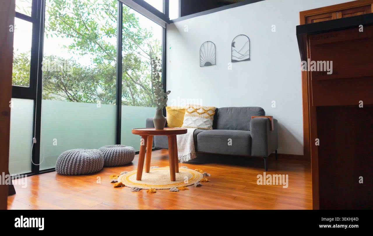 Bright living room with windows Stock Video Footage - Alamy